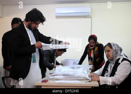 Election workers count ballots following parliamentary elections in ...