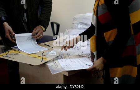 Election workers count ballots following parliamentary elections in ...