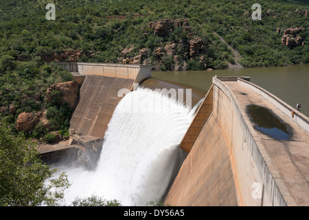 the swadini dam waterfall near the blyde river with the dragensberg as ...