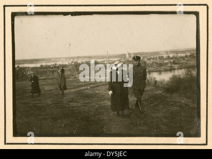 German officers walking with women Stock Photo - Alamy