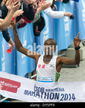 Joel Maina Mwangi, Kenya, crosses the finish line to win the Stock ...