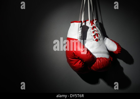 Hanging boxing gloves Stock Photo - Alamy