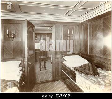 An en suite room aboard the Cunard Line’s RMS Lusitania, showing the ...