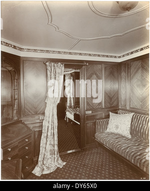 An en suite room aboard the RMS Lusitania, featuring luxury furniture ...