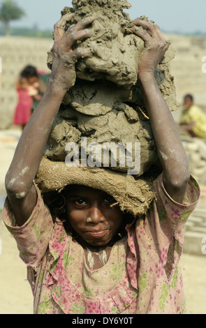 India Westbengal , children work in brick industry, children carry ...