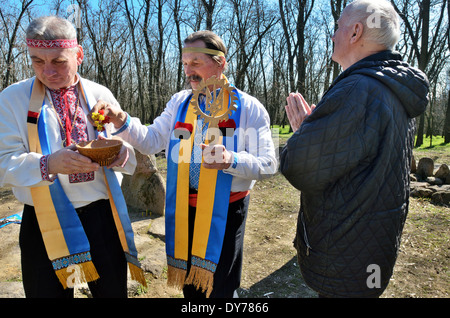 Proto-Slavic pagan rituals in Ukraine. Priests pray to the sun Stock ...