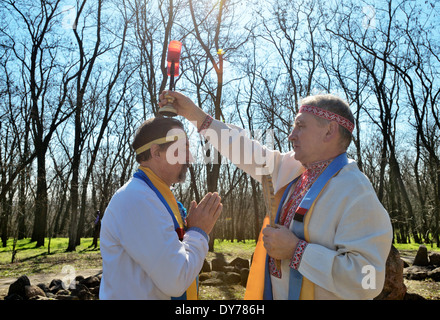 Proto-Slavic pagan rituals in Ukraine. Priests pray to the sun Stock ...