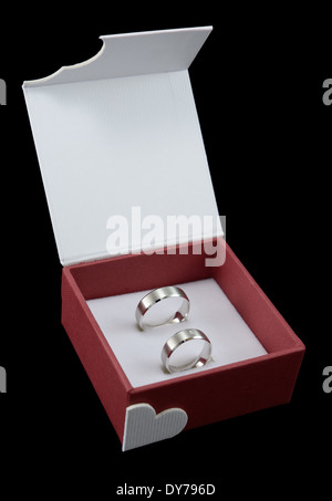 A pair of gold wedding rings in the snow.Two wedding rings Stock Photo ...