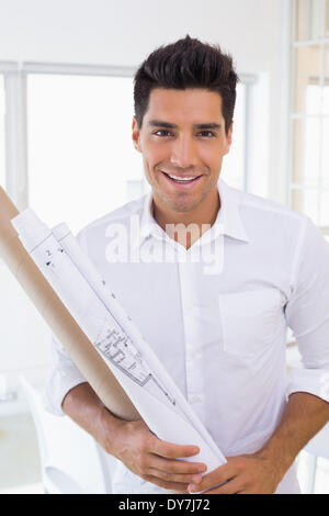 Casual handsome man smiling at camera, hands in pocket Stock Photo - Alamy