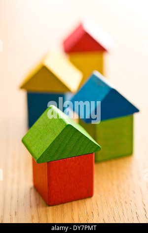 Houses shape made of wooden blocks and home keys lying on electrical ...