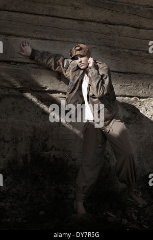 Young woman wearing pilot work cloth Stock Photo - Alamy