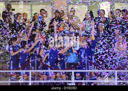 Japan squad celebrate holding World Cup Winners Stock Photo - Alamy