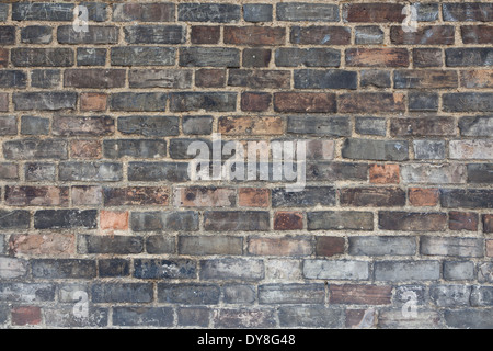 Multi coloured brick wall background and texture. Different bricks can ...