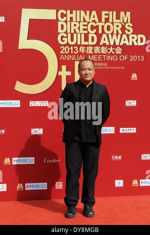 Beijing, China. 10th Apr, 2014. Director Meng Jinghui (1st L) talks ...