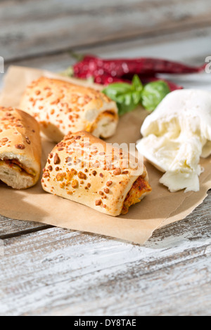 Panini alla Pizzaiola, pizza rolls filled with chili Stock Photo - Alamy