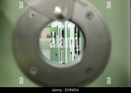 British police custody cell corridor. View through cell door 'spy-hole ...