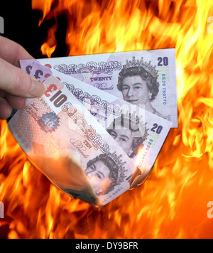 An illustration of the concept of having money to burn - UK sterling ...