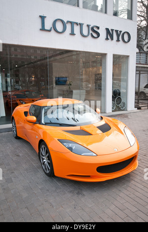 Lotus Evora in front of Lotus NYO car showroom at Workers' Stadium ...