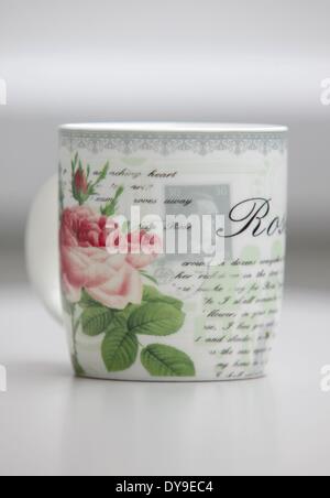 A mug with a print of a faded stamp with a portrait of Nazi dictator ...