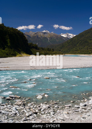 New Zealand landscape. Whataroa River and Southern Alps mountain range ...