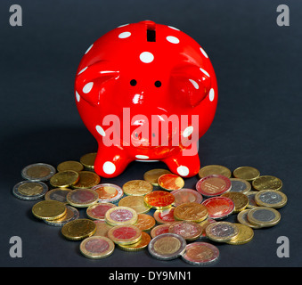Business and Economics. On a red background, a magnifying glass and a ...