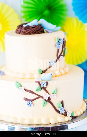 Gourmet Spring two layer cake with blue birds and spring flowers Stock ...