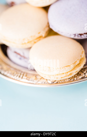 Gourmet Spring macaroons on silver platter Stock Photo - Alamy