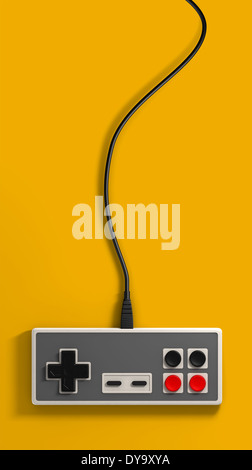 A regular vintage rectangular gaming controller with red and black ...