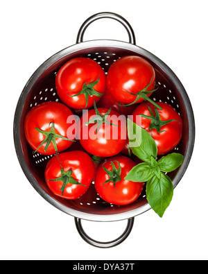 Colander with fresh green basil on wooden table, closeup Stock Photo ...