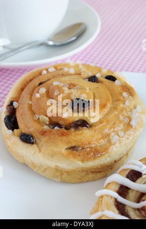 Chelsea bun a traditional British type of currant bun glazed in sugar ...