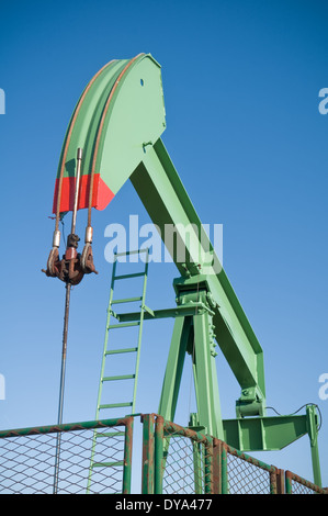 Working oil pump with blue sky Stock Photo - Alamy