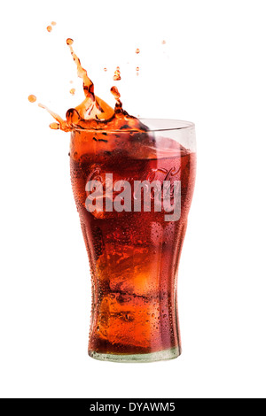 Coke splashing out of glass Stock Photo - Alamy