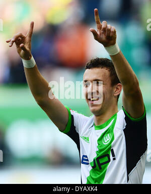 Wolfsburg, Germany. 12th Apr, 2014. Wolfsburg's Ivica Olic celebrates ...