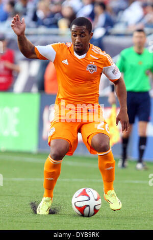 Corey Ashe (#26) Midfielder for the Houston Dynamo and Carlos Rodriguez ...