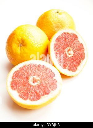 Fresh composition of yellow and red grapefruits Stock Photo - Alamy