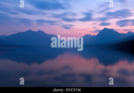A fall sunrise over McDonald Lake in Glacier National Park, Montana ...