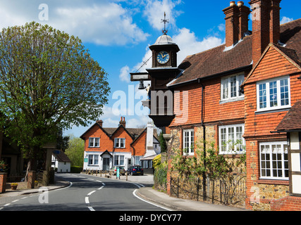 Abinger Hammer Clock overhangs the main road and portrays the figure of ...