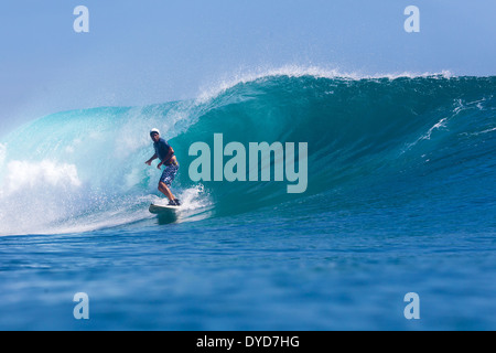 Surfing at GLand surf area. Java island. Indonesia Stock Photo - Alamy