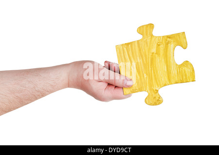 male hand with painted yellow puzzle piece isolated on white background ...