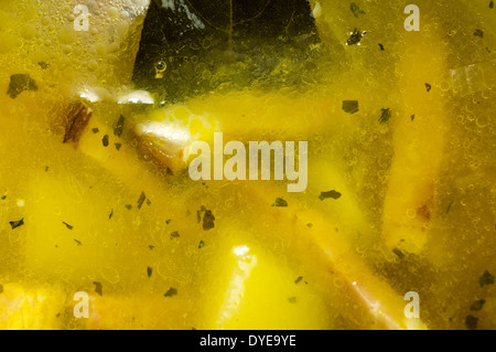 Soup with bacon, peas and vegetables and bay leaf Stock Photo - Alamy