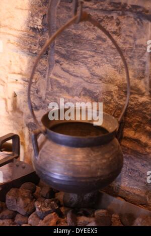 Metal Cauldron Suspended in a Fireplace 16th Century. Located in ...