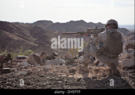 A US Marine Corps scout sniper with 1st Marine Division prepares an ...