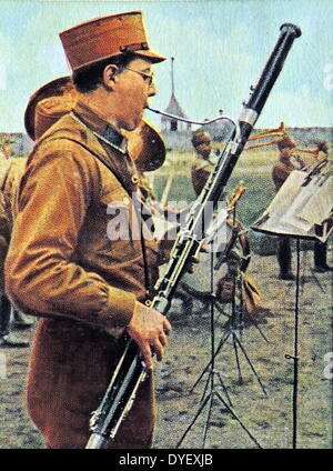 Nazi uniformed musician palying instrument at a rally. Germany circa ...