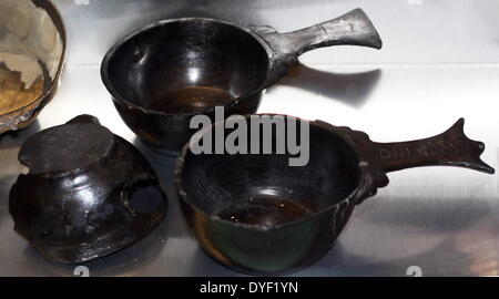 Roman ink pot with pewter bowls and dishes. It is most likely all these ...