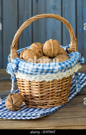 Walnuts in a little basket Stock Photo - Alamy