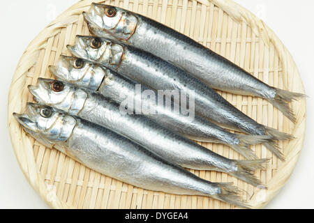 Grilled whole dried sardines Stock Photo - Alamy