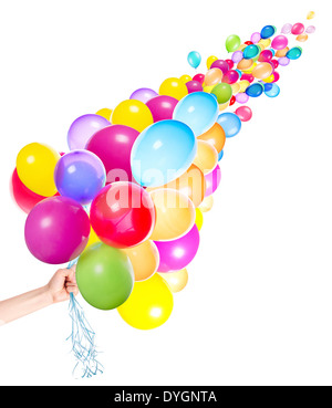 human hand gives flying balloons isolated. Holiday background Stock ...