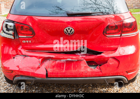 Crashed red Volkswagen Golf GTI car - damaged by rear impact Stock ...