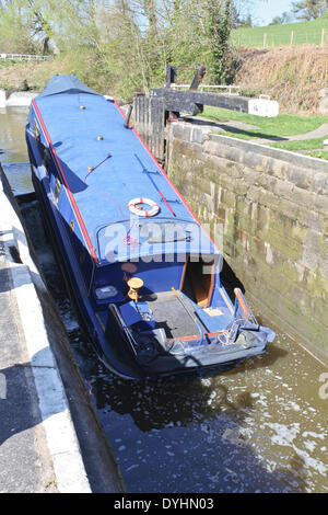 Chorley, Lancashire, Uk. 18th March 2014. Canal Barge grounded on lock ...