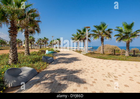 A promenade with benches along the sea Stock Photo - Alamy